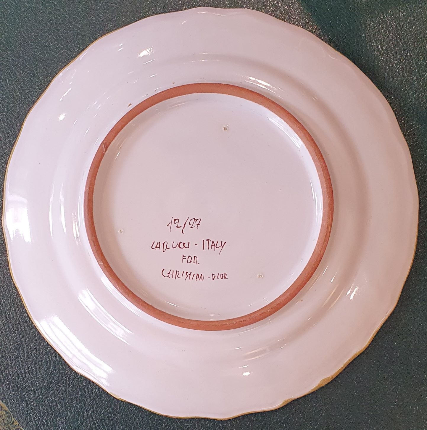 A set of 8 Christian Dior Plates