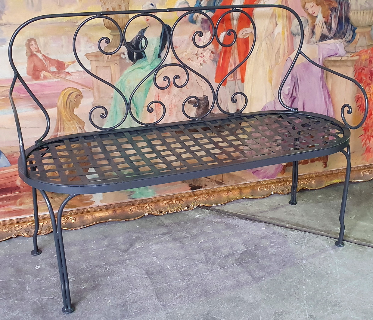 A Wrought Iron Garden Bench
