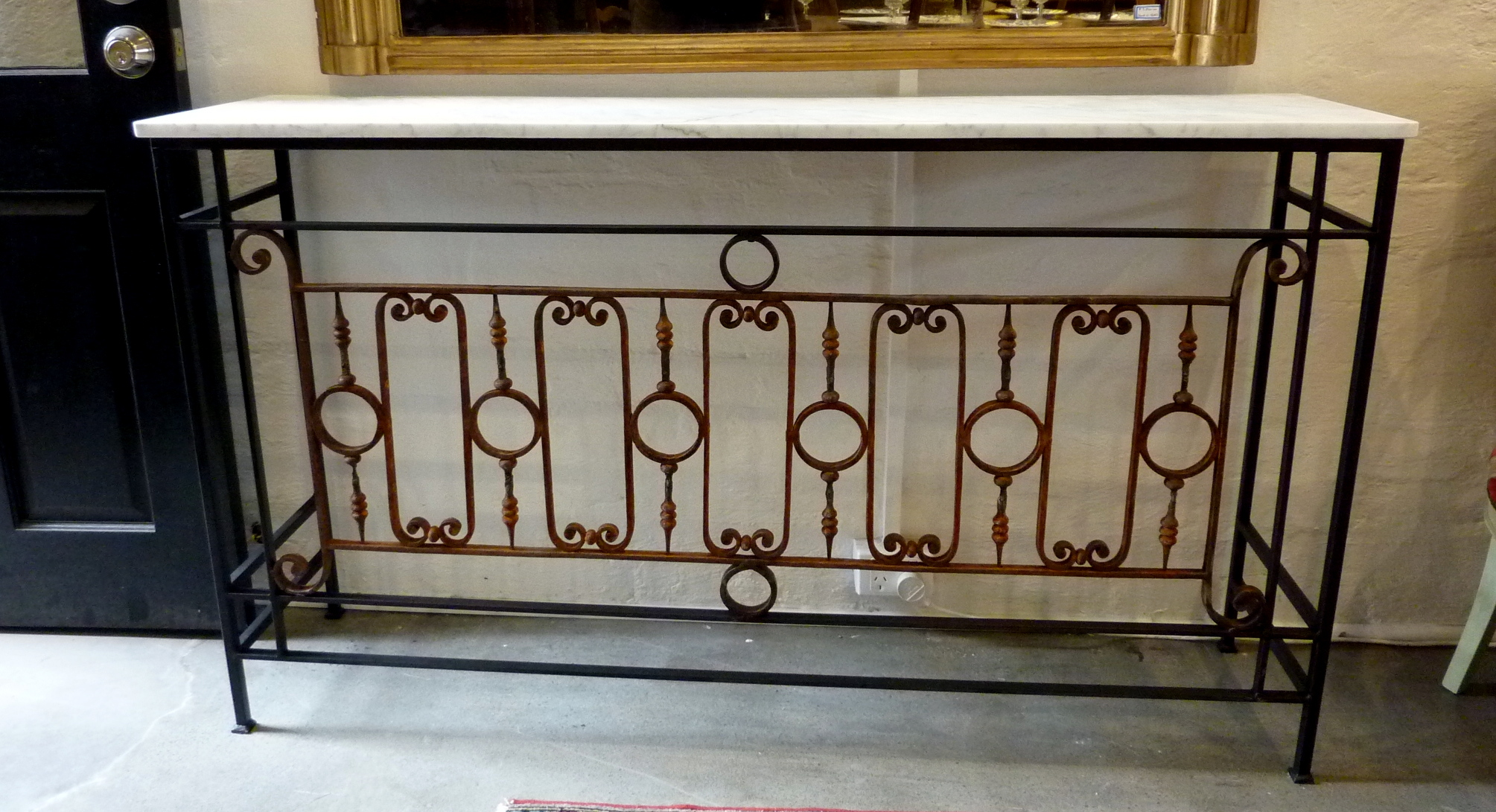 A wrought iron Console Table